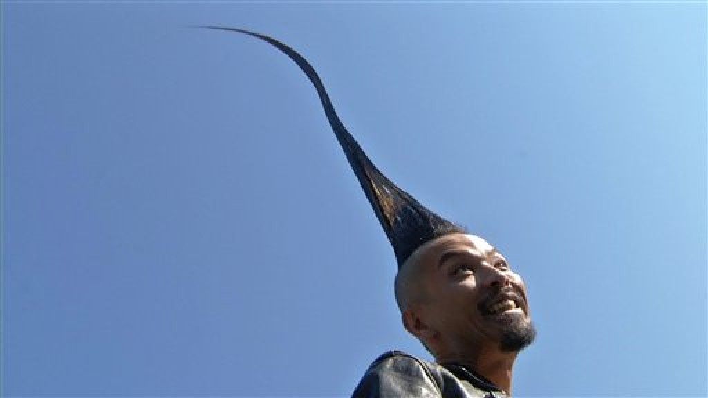 Weird News: Man shows off Guinness’ tallest mohawk in NYC park | News ...